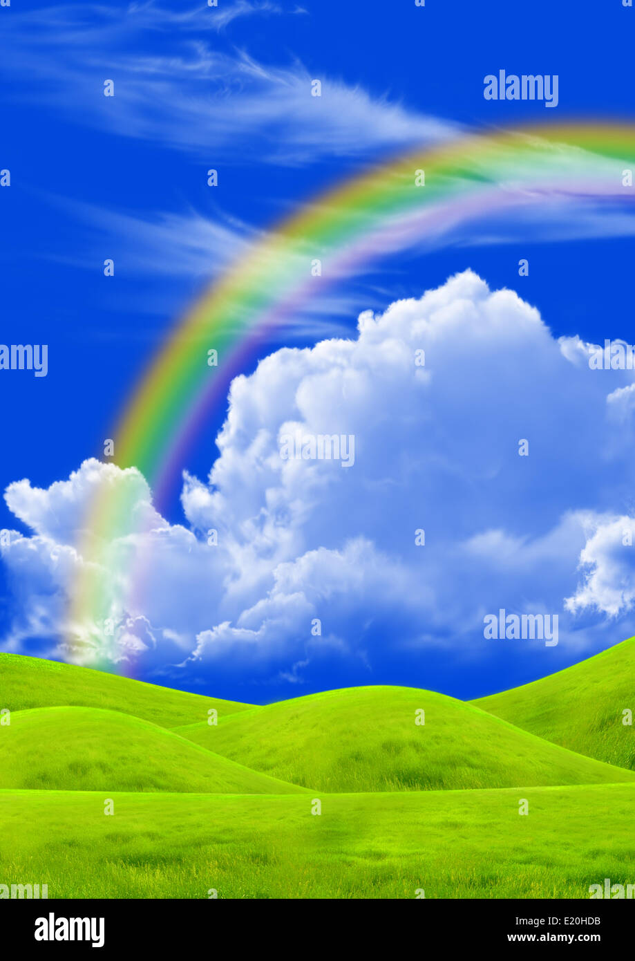 Green field and rainbow Stock Photo - Alamy