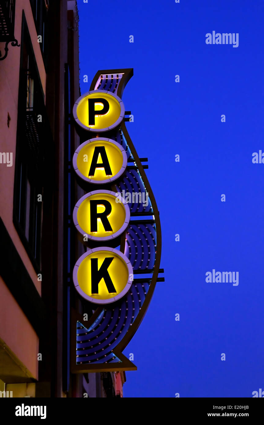 Sign neon parking arrow hi-res stock photography and images - Alamy