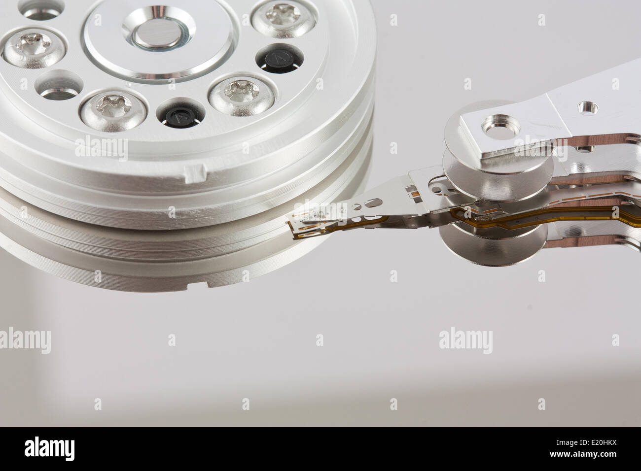 Platters and head of a computer hard drive Stock Photo - Alamy