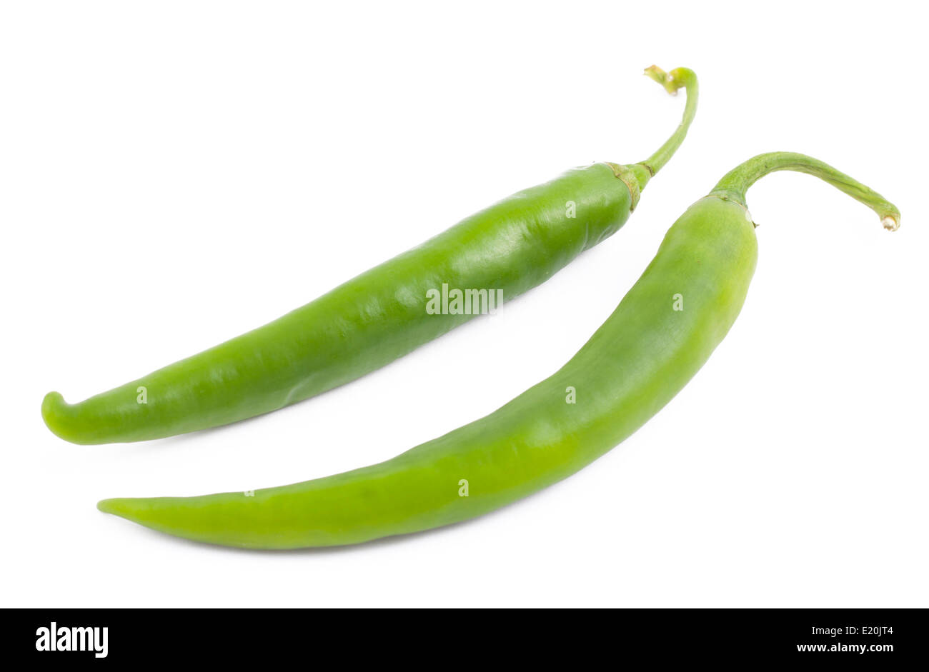 Two green chili peppers on white Stock Photo - Alamy