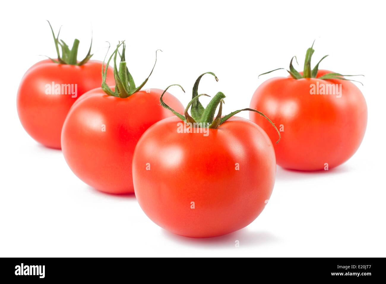 Four ripe tomatoes Stock Photo - Alamy