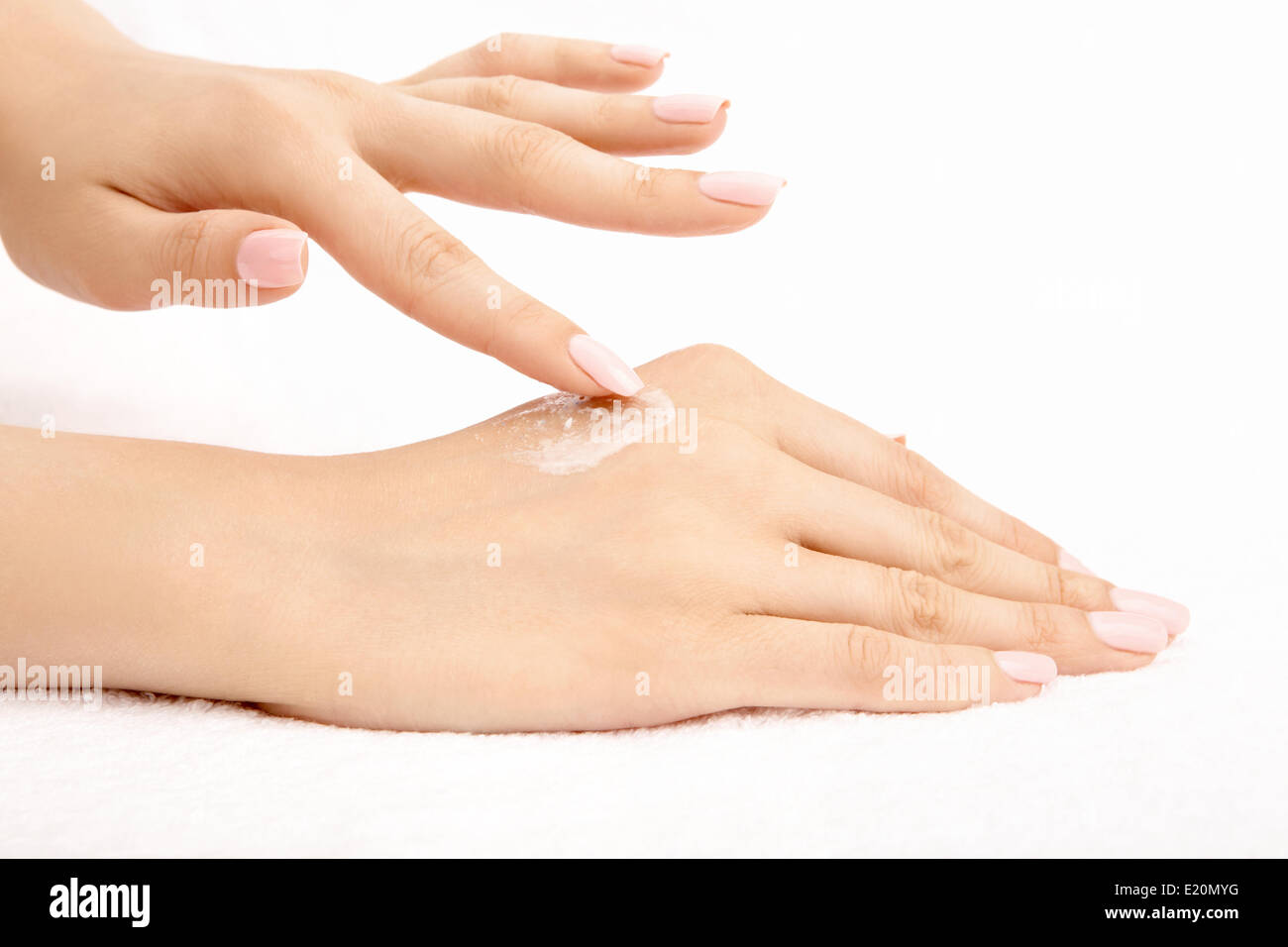 Cream on hand hi-res stock photography and images - Alamy