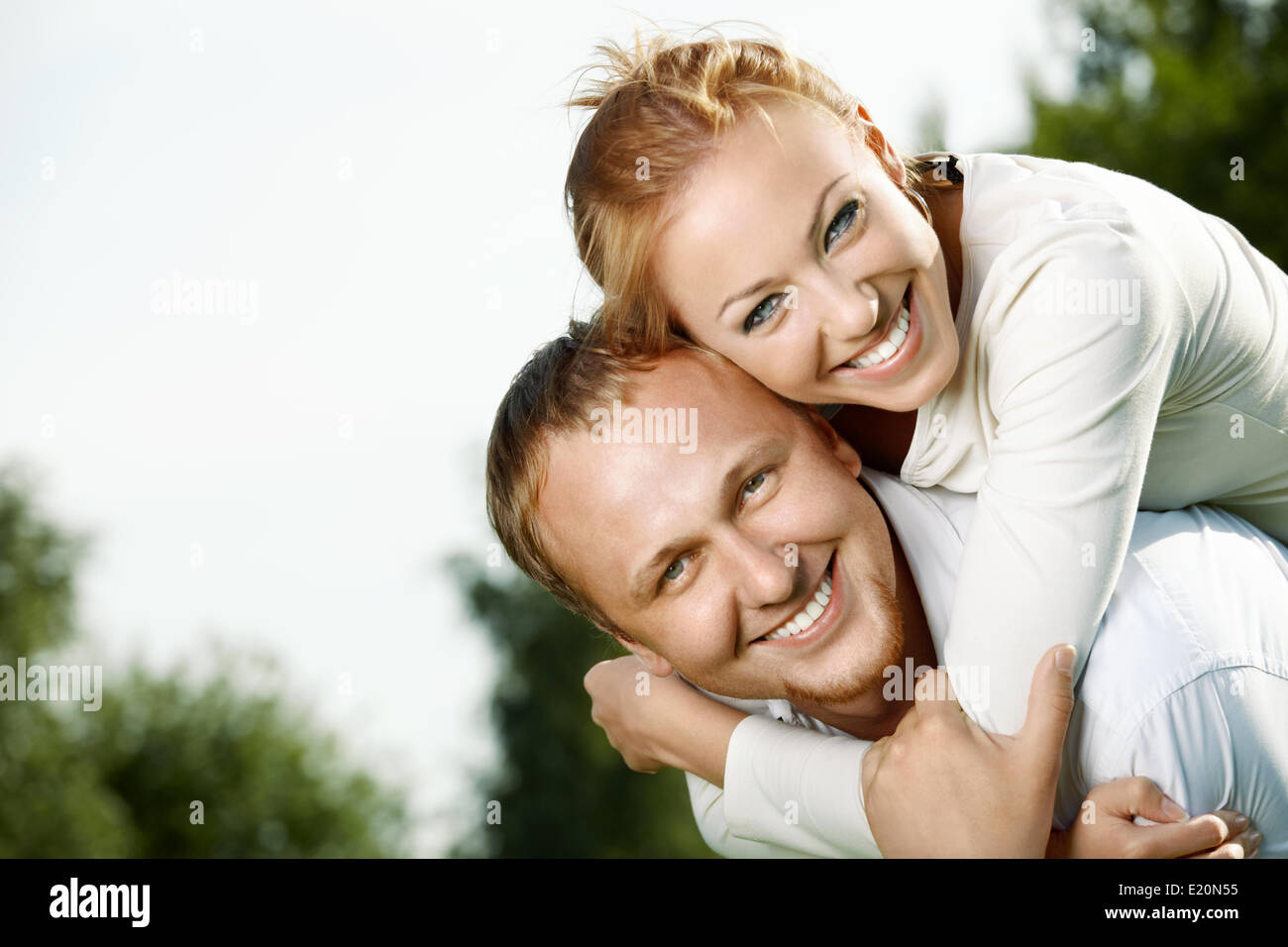 Happy pair has rest in a summer garden Stock Photo - Alamy