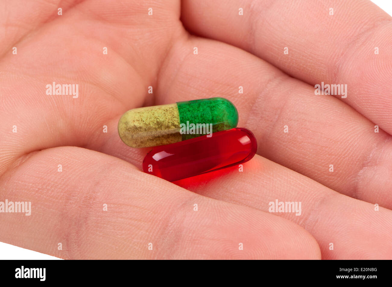 Pills on a palm close up Stock Photo - Alamy