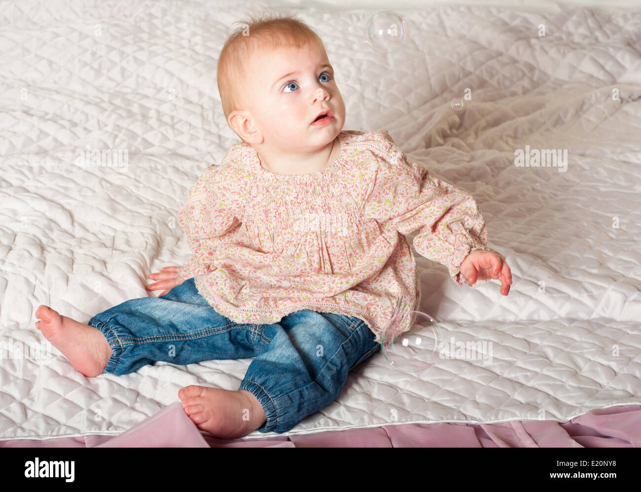 Baby with bubbles Stock Photo - Alamy