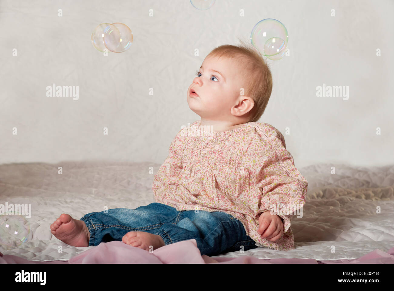 Baby catching bubbles hi-res stock photography and images - Alamy