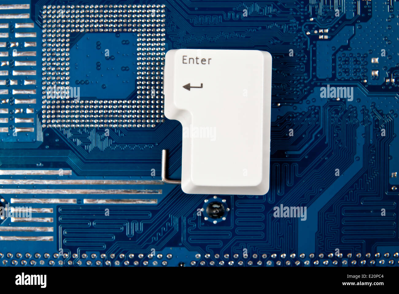Enter key on circuit board Stock Photo - Alamy