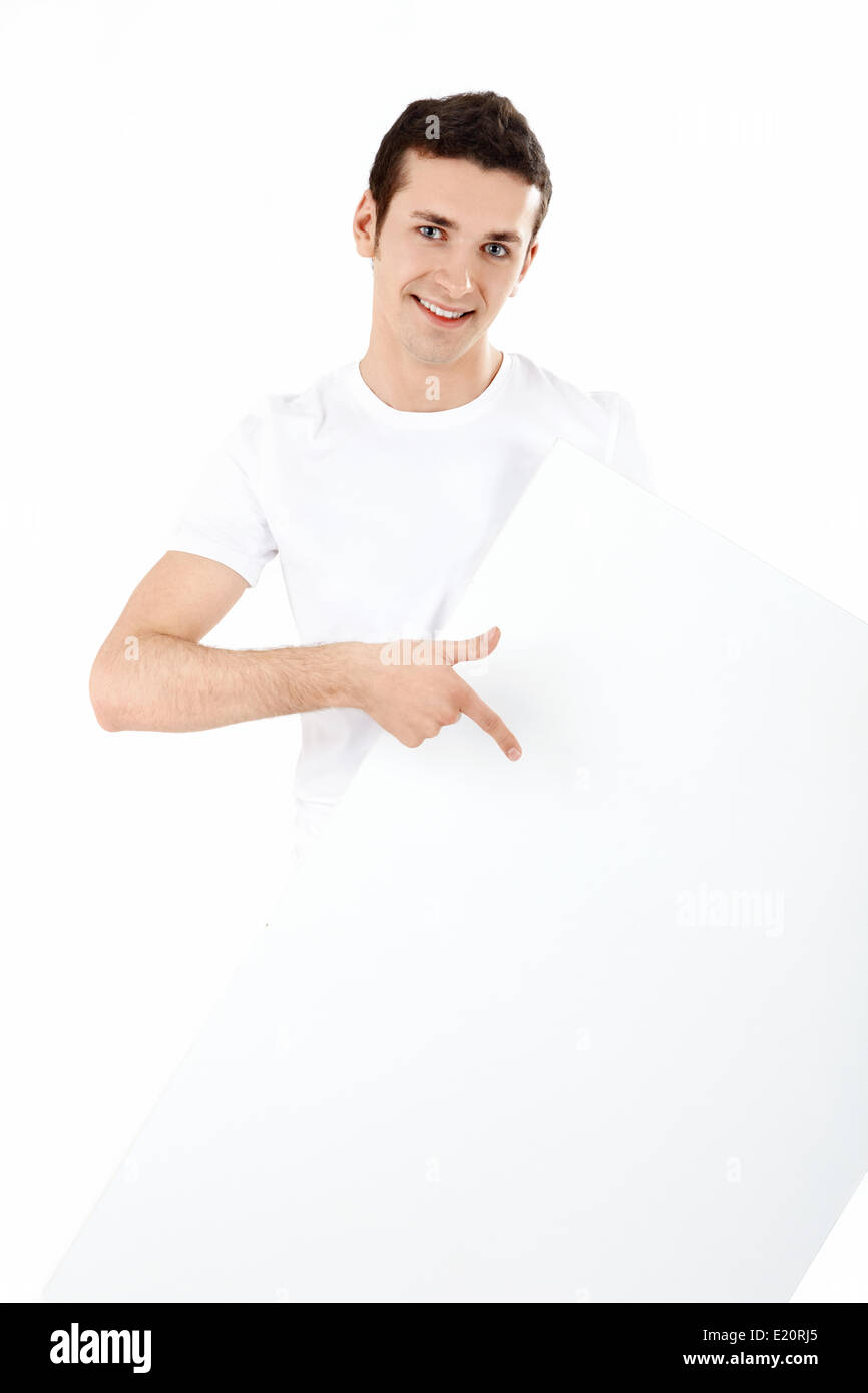 The young man shows on the empty form Stock Photo - Alamy