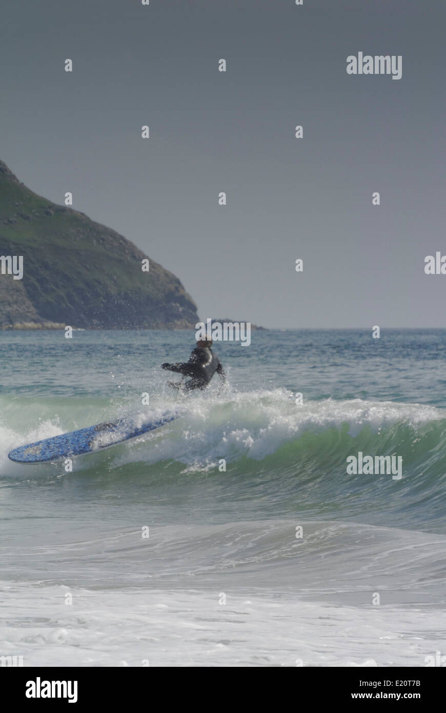 paddle boarding in the surf at Porth Neigwl, North Wales Stock Photo ...