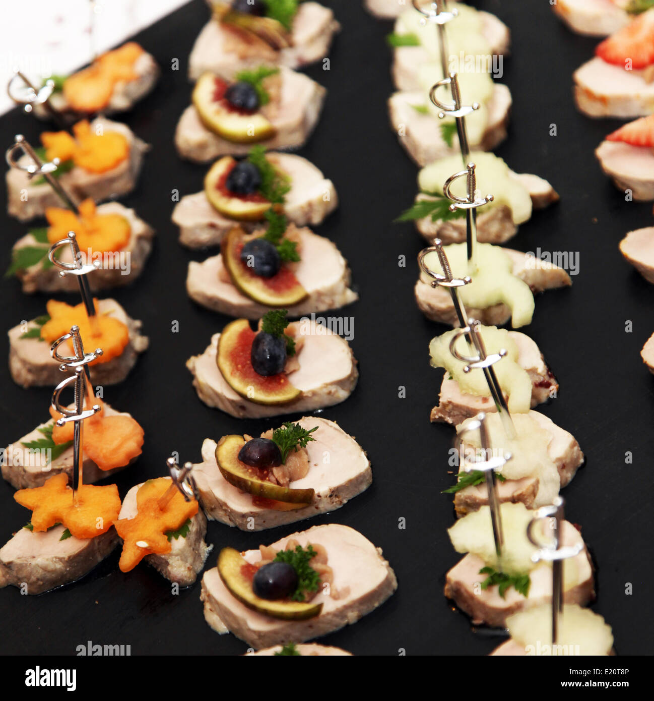 finger food or appetizers - Meat decorated Stock Photo - Alamy