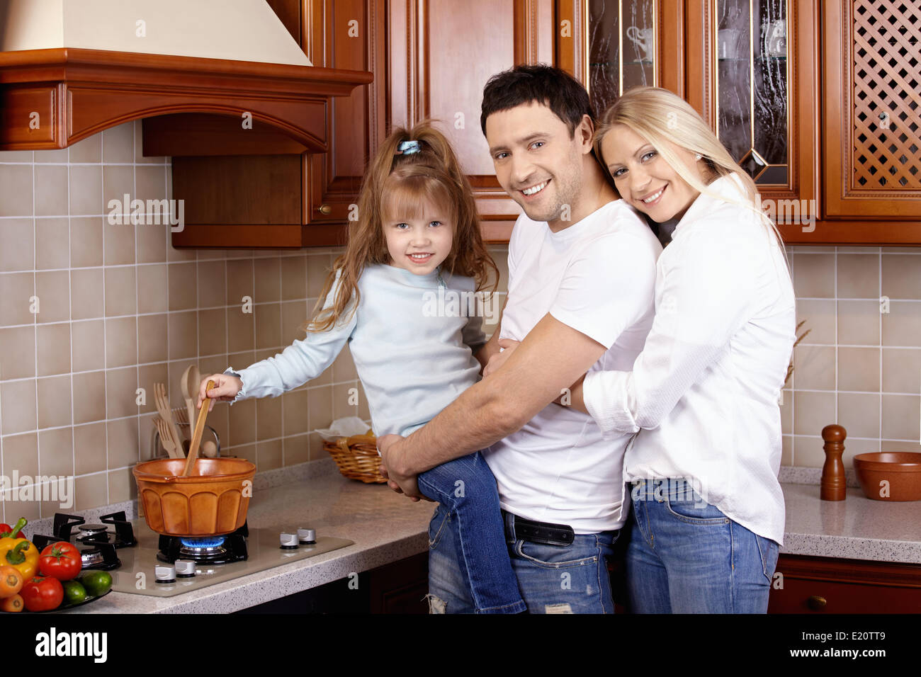 Parents with the child prepare Stock Photo - Alamy