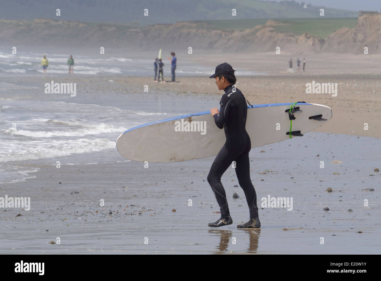Preparing the surfing session at Porth Neigwl, North Wales Stock Photo ...