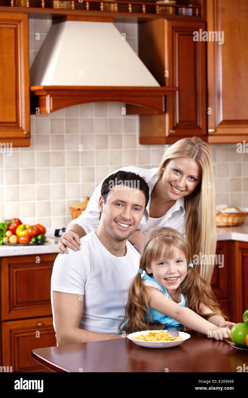 Family in kitchen Stock Photo - Alamy