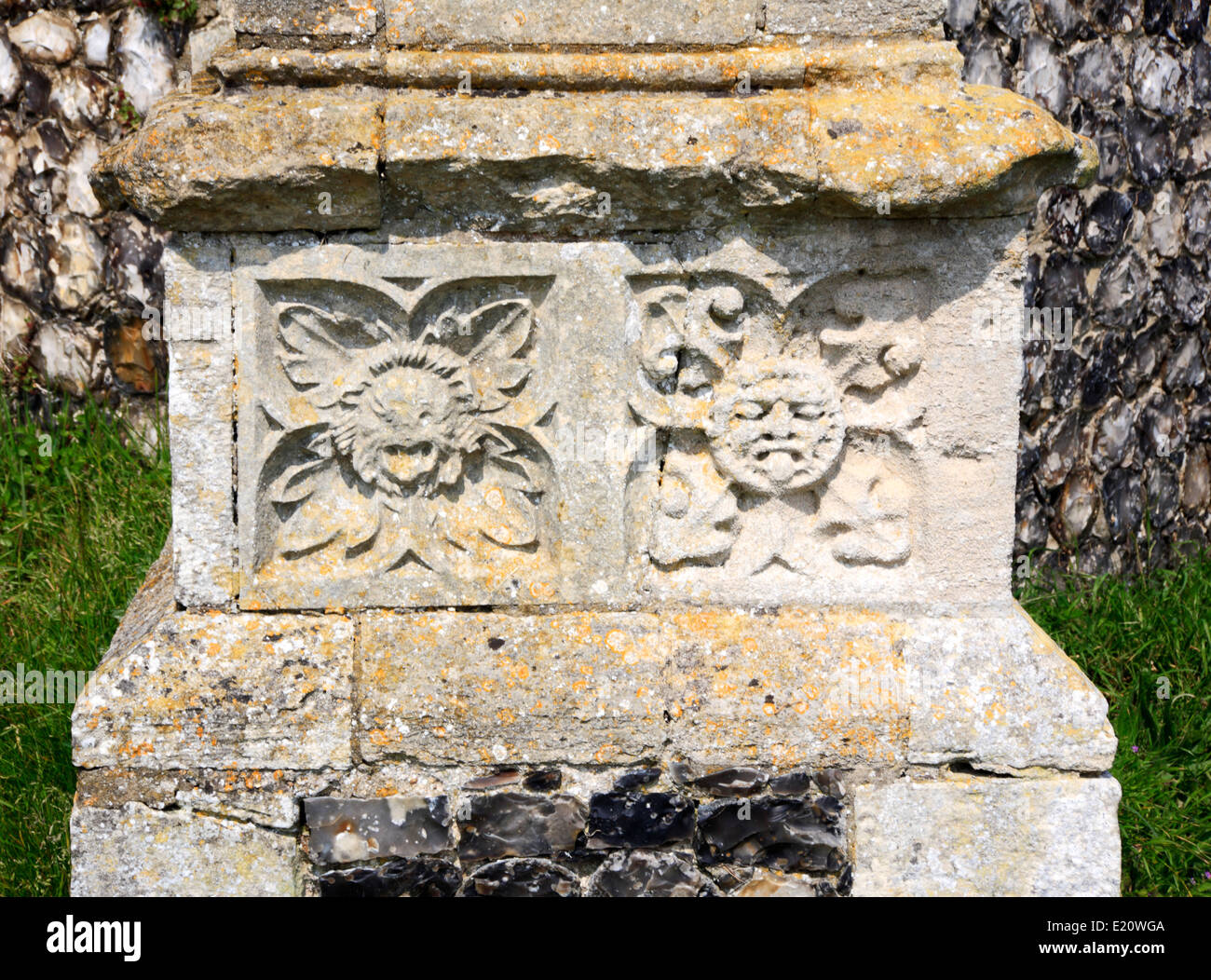 Carved stonework at the base of a buttress on the south wall of the ...
