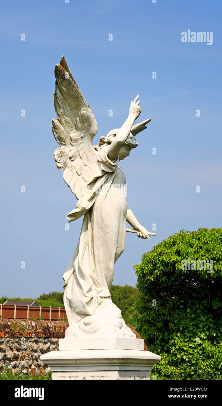A memorial angel sculpture in the churchyard of the parish church at ...