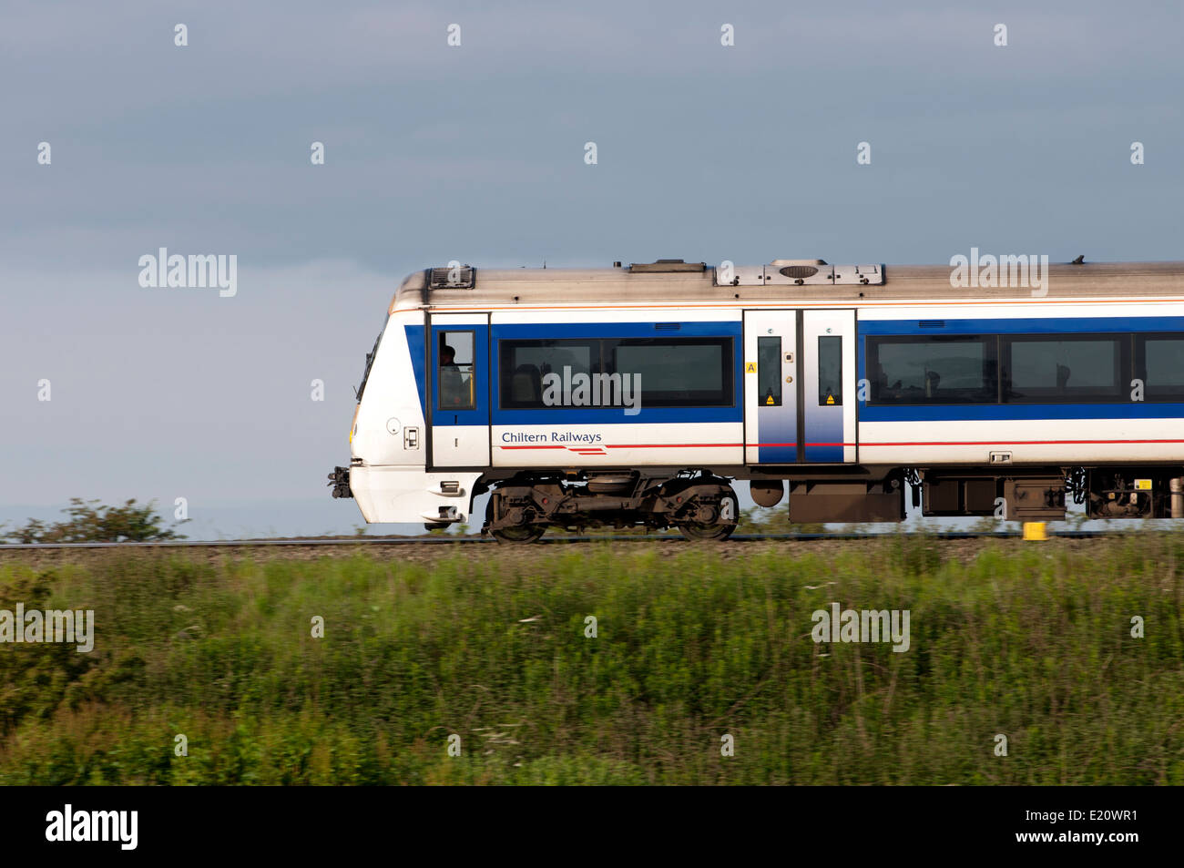 Chiltern Railways train at speed, Warwickshire, UK Stock Photo - Alamy