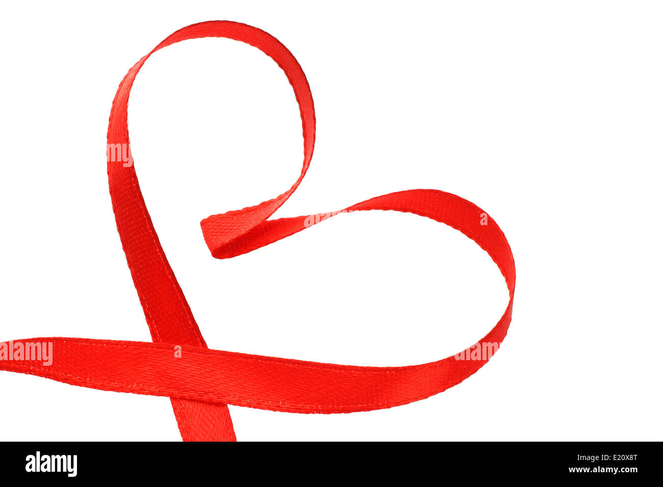 Red ribbon heart on white background Stock Photo - Alamy