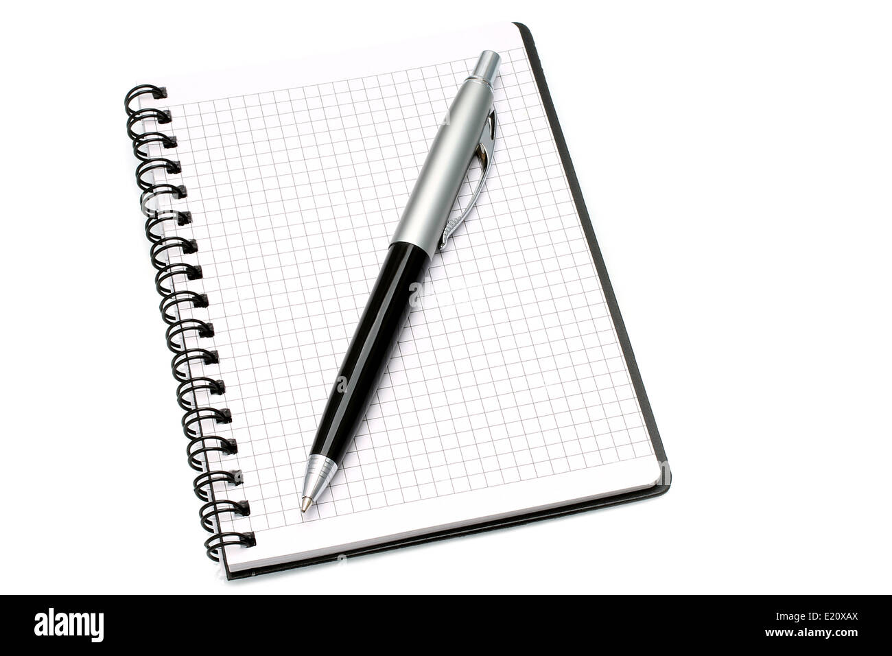 Notepad with ball pen on a white background Stock Photo - Alamy