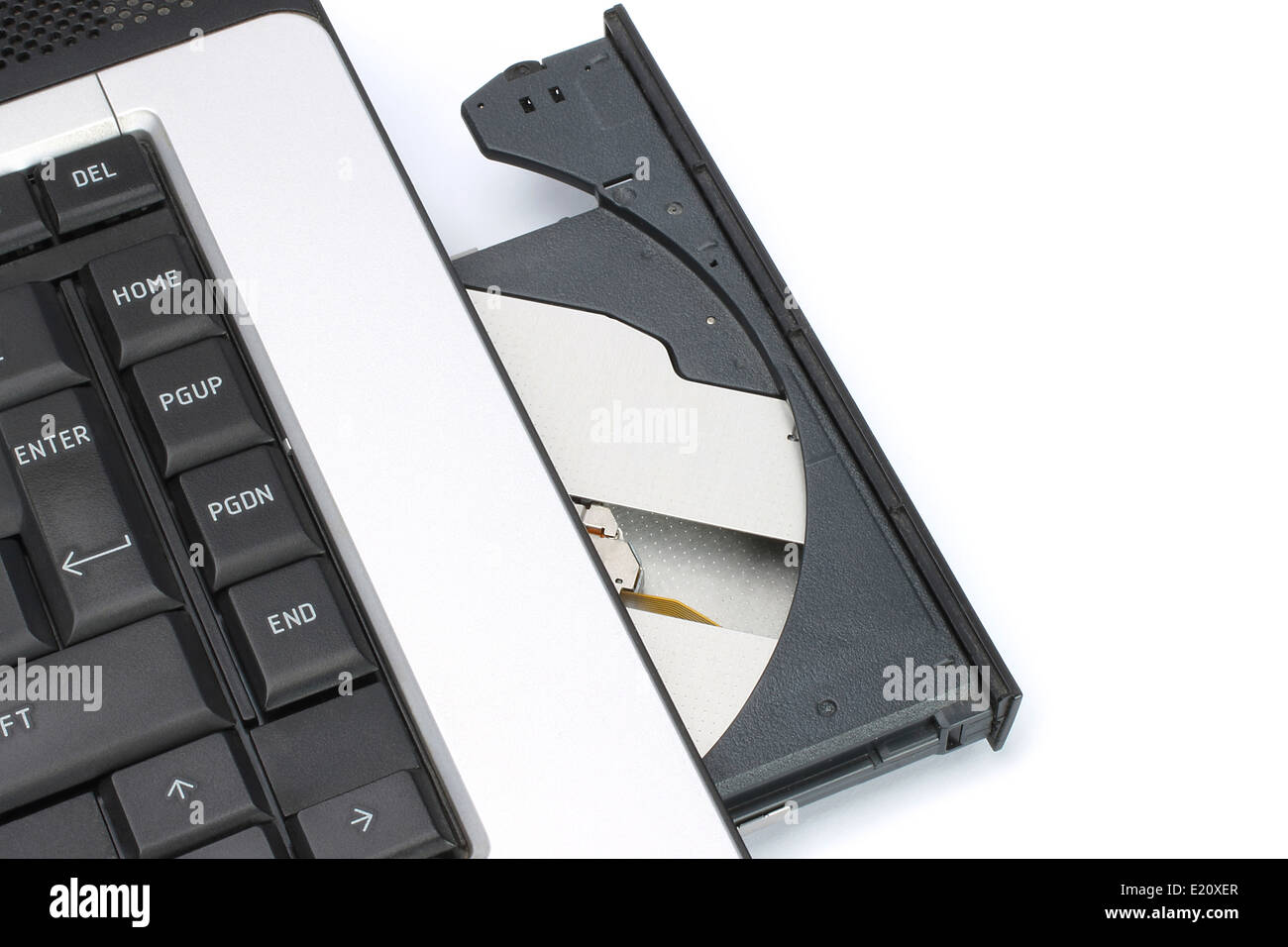 Notebook with cd case open on white background Stock Photo - Alamy