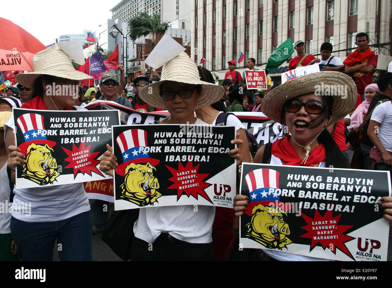 Manila, Philippines. 12th June, 2014. Protesters shouting slogans while ...