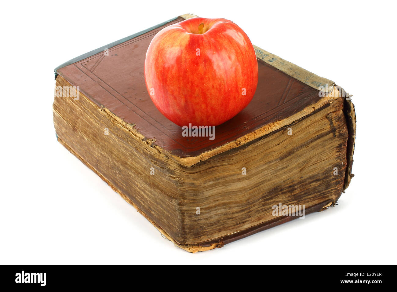 Old book with apple on a white background Stock Photo - Alamy