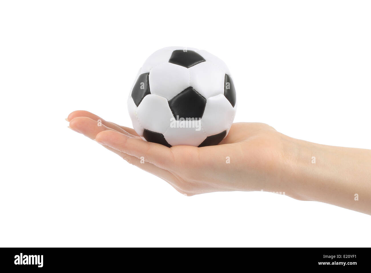 Woman hand with football on white background Stock Photo - Alamy