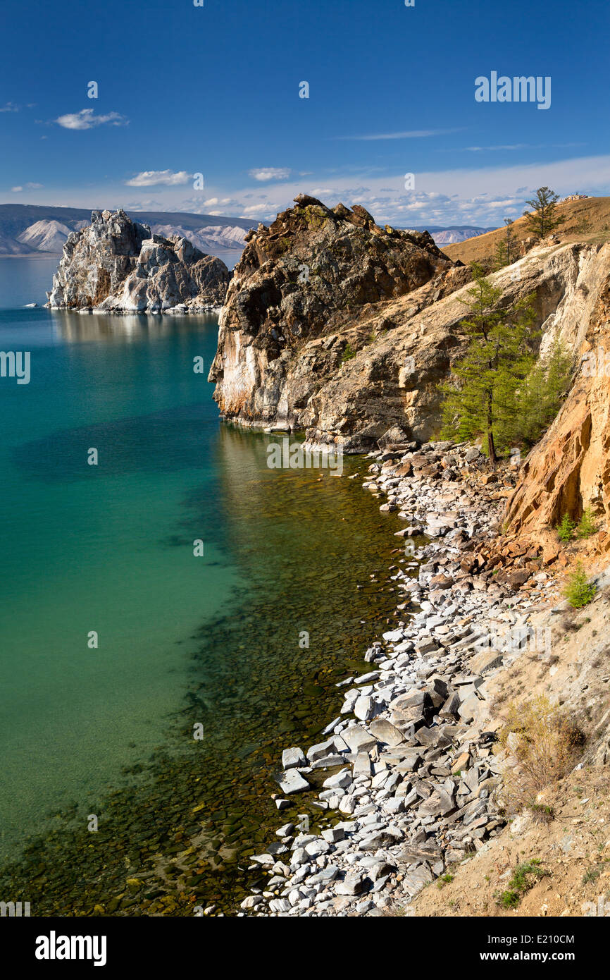 View of coast of Baikal lake, Shaman rock and cape Burhan on Olkhon ...