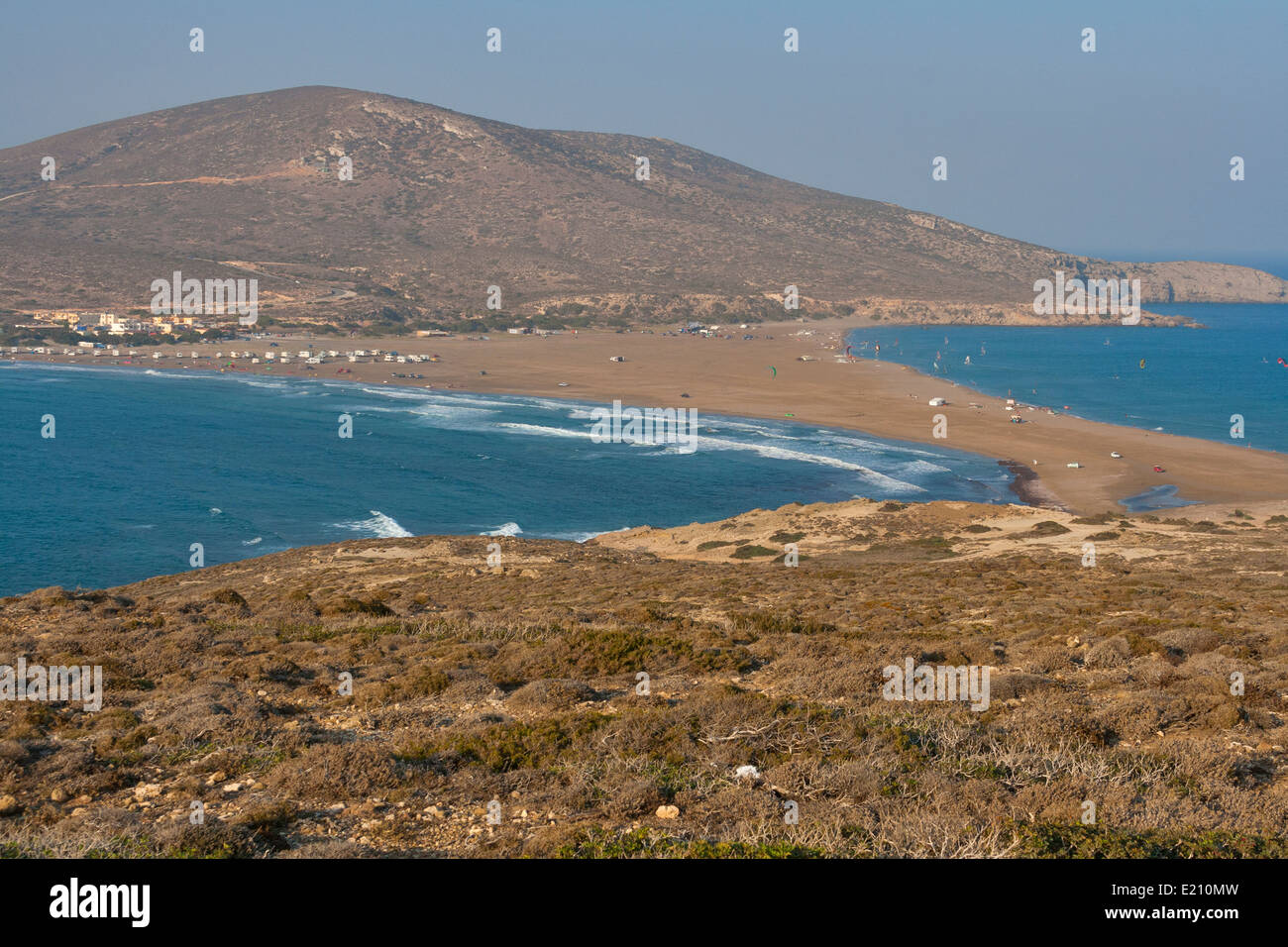 Sea landscape with land neck and surfers. Western coast of Rhodes ...