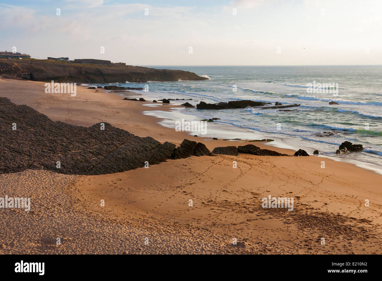 Cliffs surround a bay in Portugal Stock Photo - Alamy