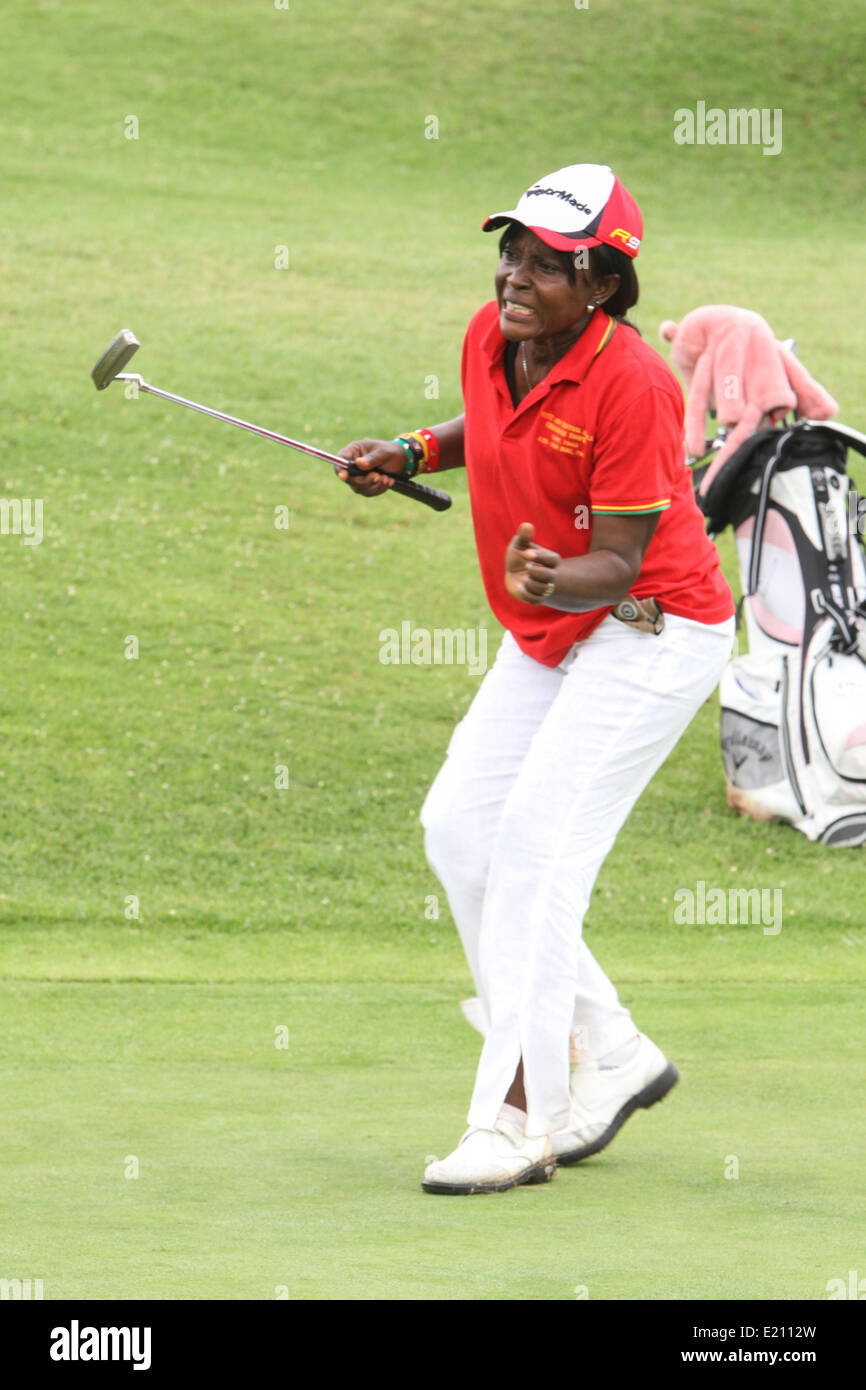 Ghana’s Felicity Okyei reacts to her putt shot during the 12th all ...