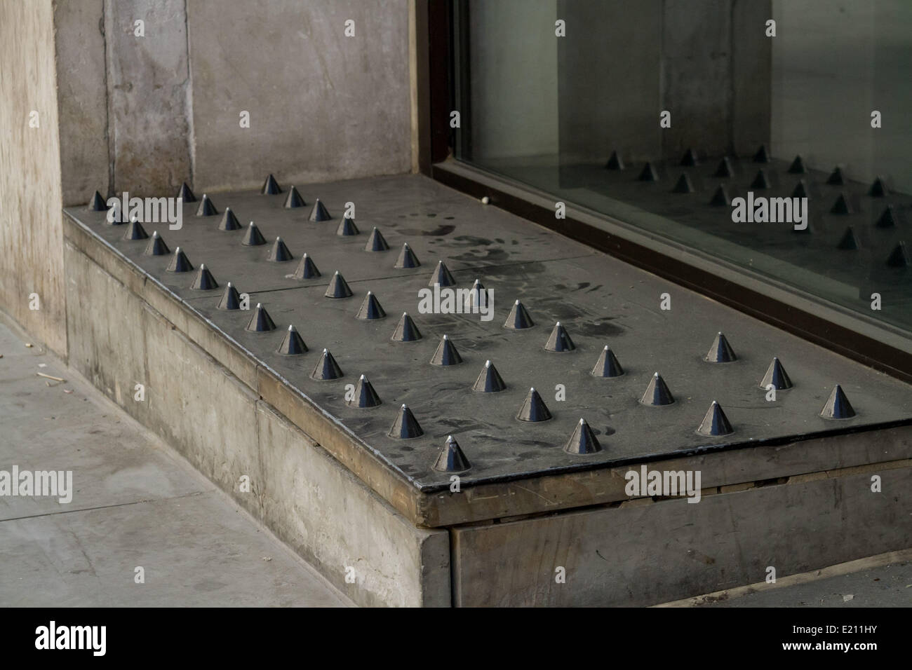 London, UK. 12th June 2014. Tesco removes anti-homeless spikes from ...