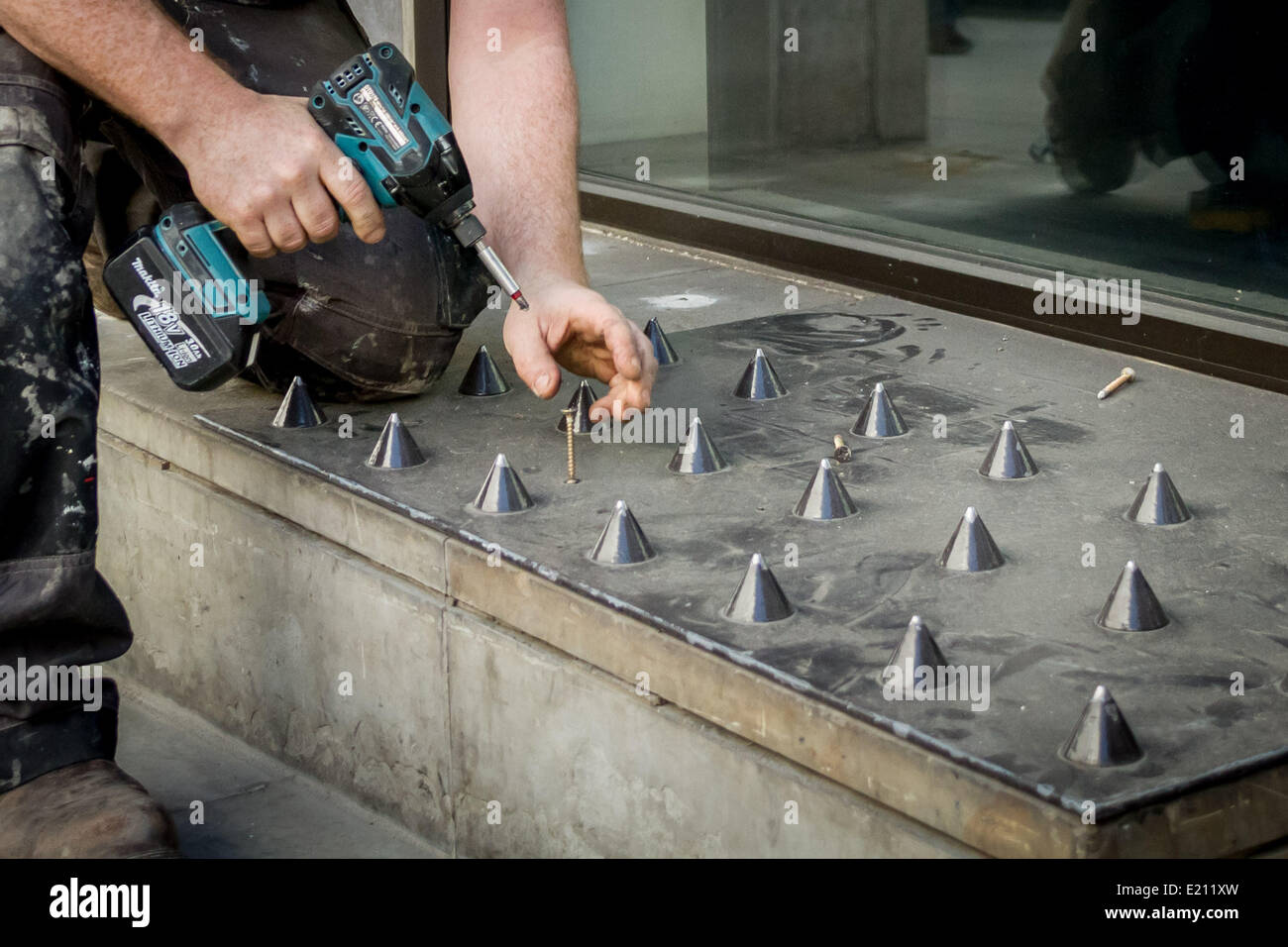 London, UK. 12th June 2014. Tesco removes anti-homeless spikes from ...