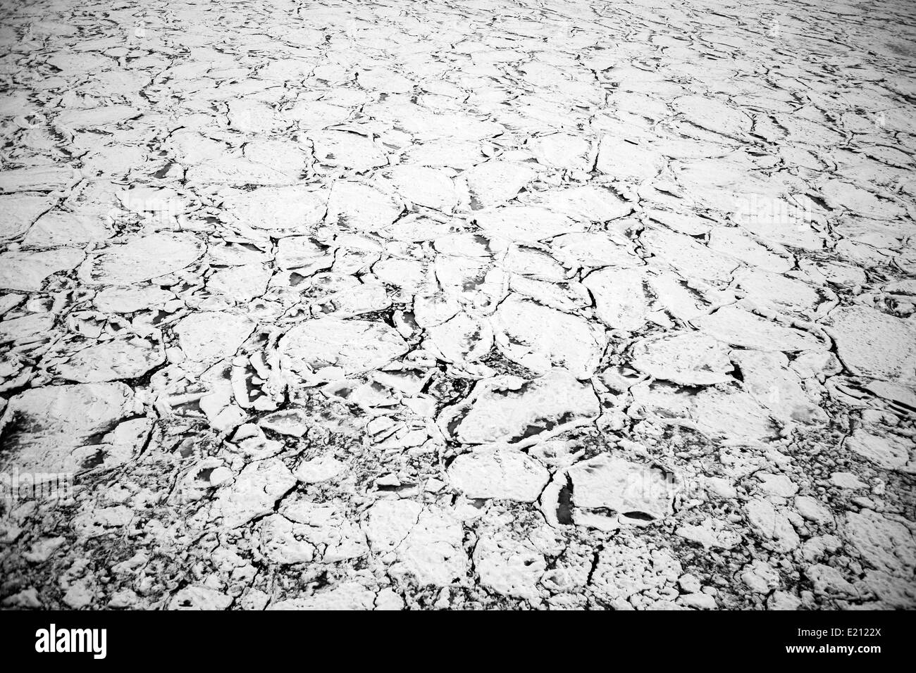 Cracked ice on the sea surface Stock Photo - Alamy