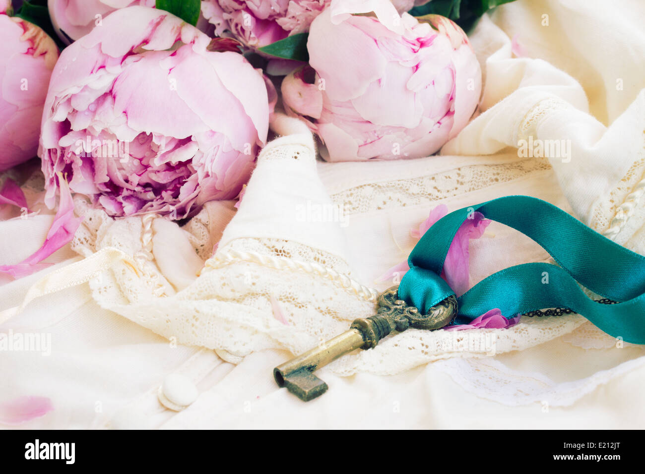 Key with peony flowers Stock Photo - Alamy