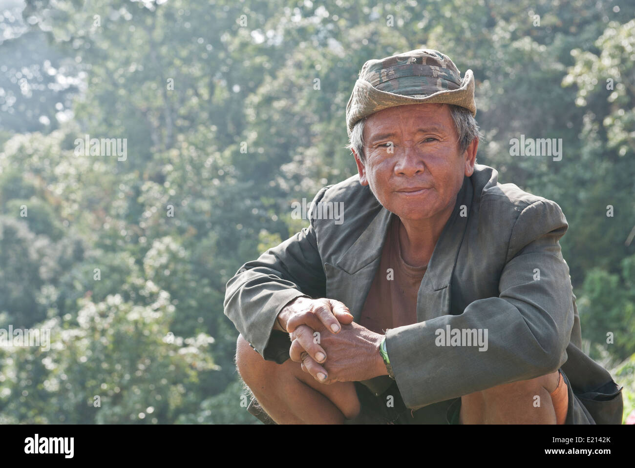 Middle aged Nepali man in Himalayan mountain range in Nepal Stock Photo ...