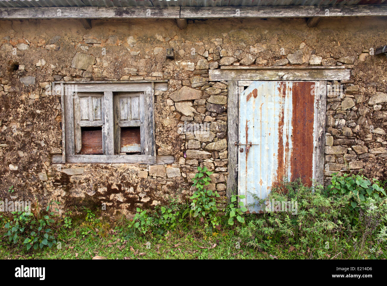 Front of old brick building in Nepal Stock Photo - Alamy