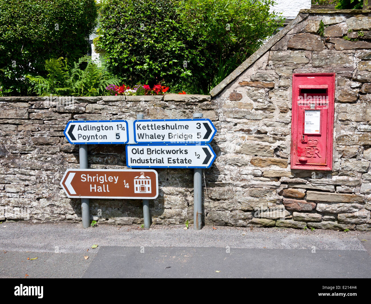 Direction information and distance signs in the village of Pott ...