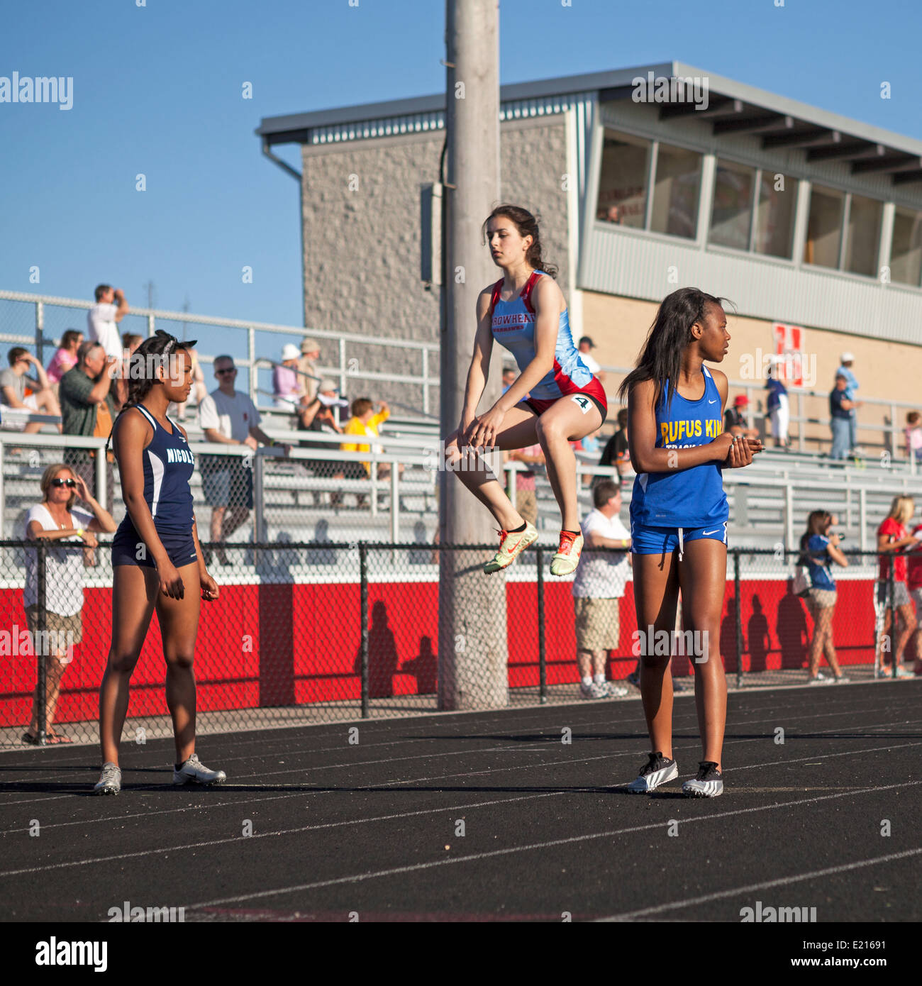 High school athletes compete in a track and field meet in Milwaukee ...