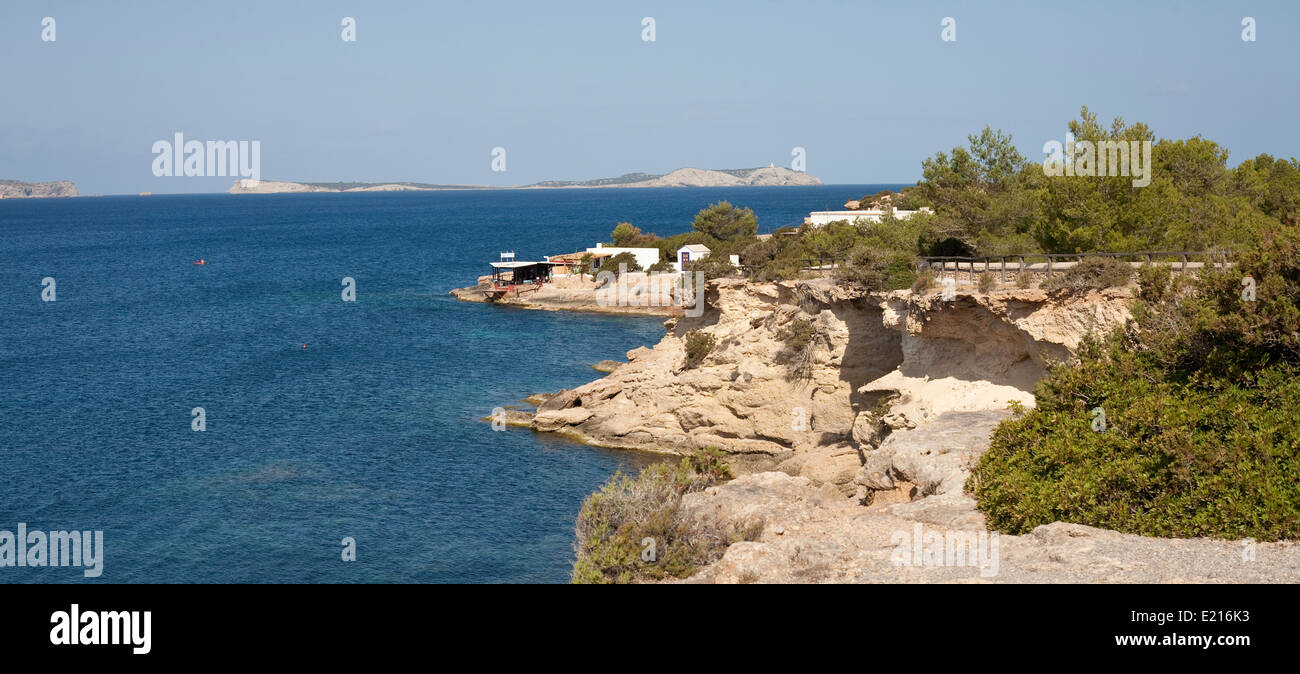 secluded bay with crystal clear turquoise waters in the Balearic sea ...
