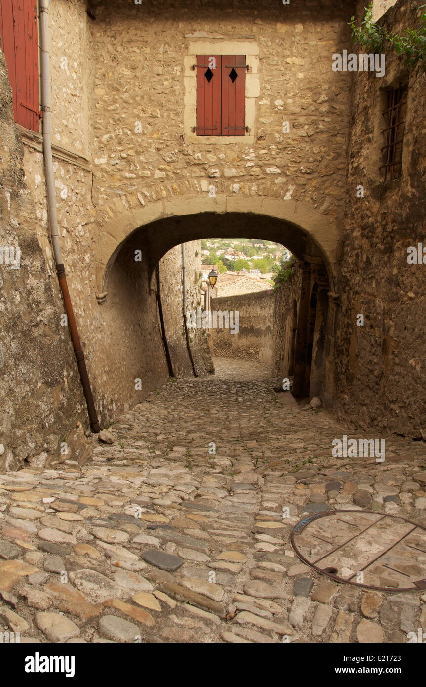 A narrow cobbled alleyway, Rue St François, leads down from the Tour de ...