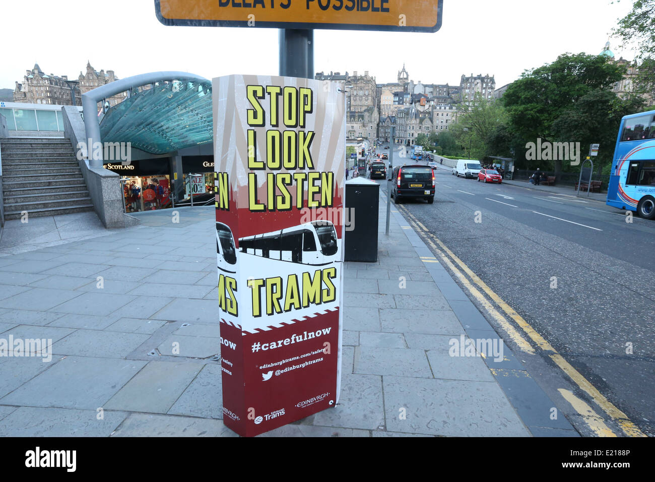 A Safety sign for new Edinburgh Trams service attached to a post on a ...