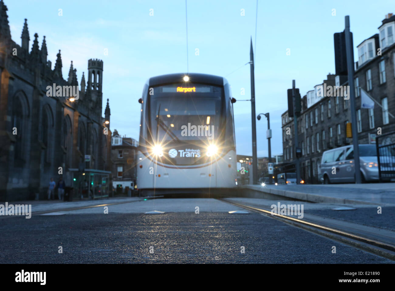 A tram carriage for Edinburgh Trams in operation on a street in ...