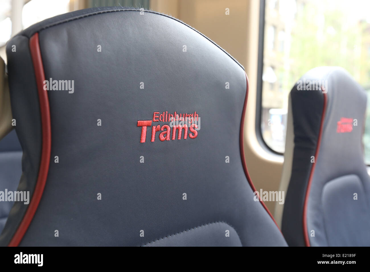The logo for Edinburgh Trams on a seat in a tram in Edinburgh city ...