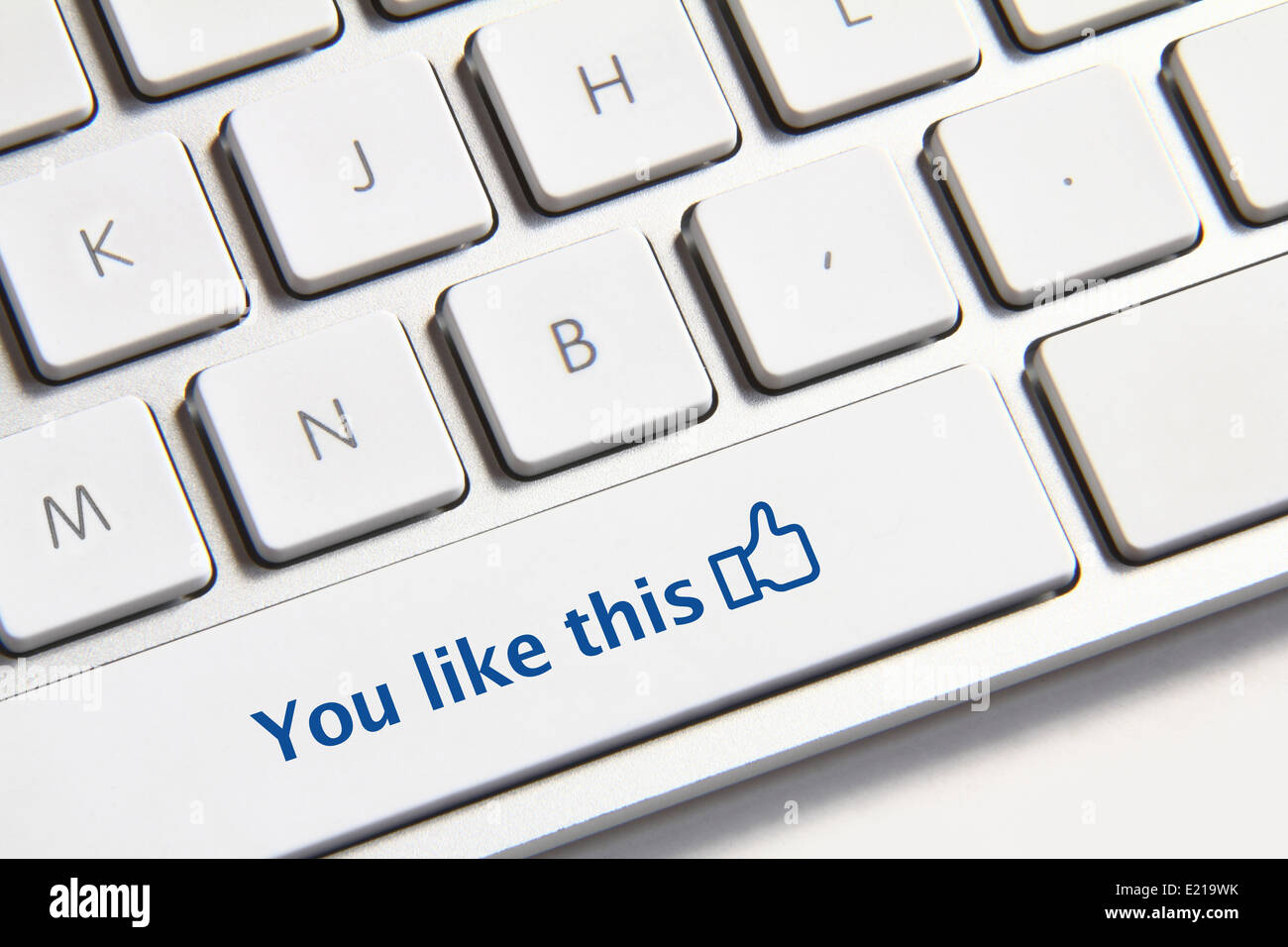 Photo of like button on the white keyboard Stock Photo - Alamy