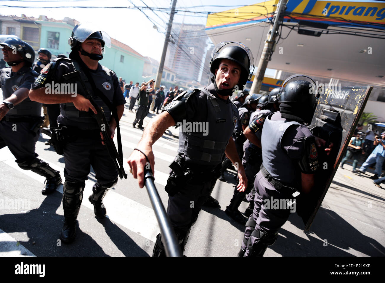 Sao Paulo, Brazil. 12th June, 2014. Riot police forces stand on guard ...