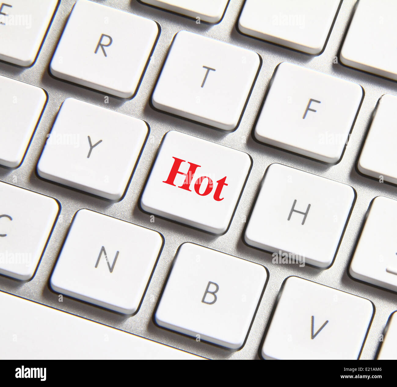 Photo of hot button on the white keyboard Stock Photo - Alamy