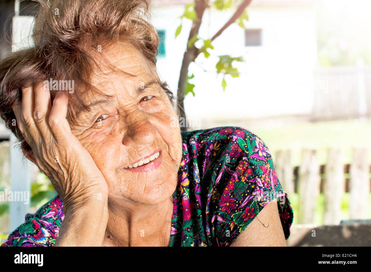 Positive smile on the face of old lady Stock Photo - Alamy