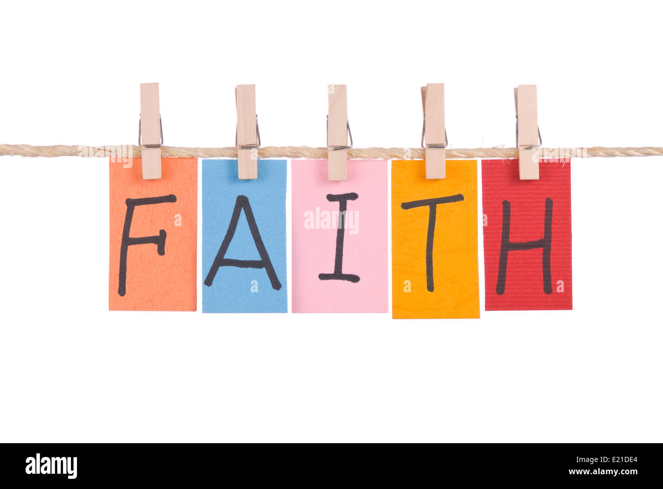 Faith, Colorful words hang on rope Stock Photo - Alamy
