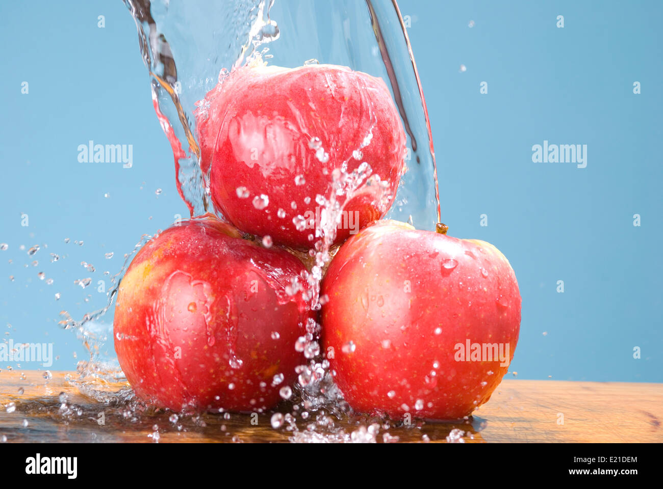 splash drop on group of apple Stock Photo - Alamy