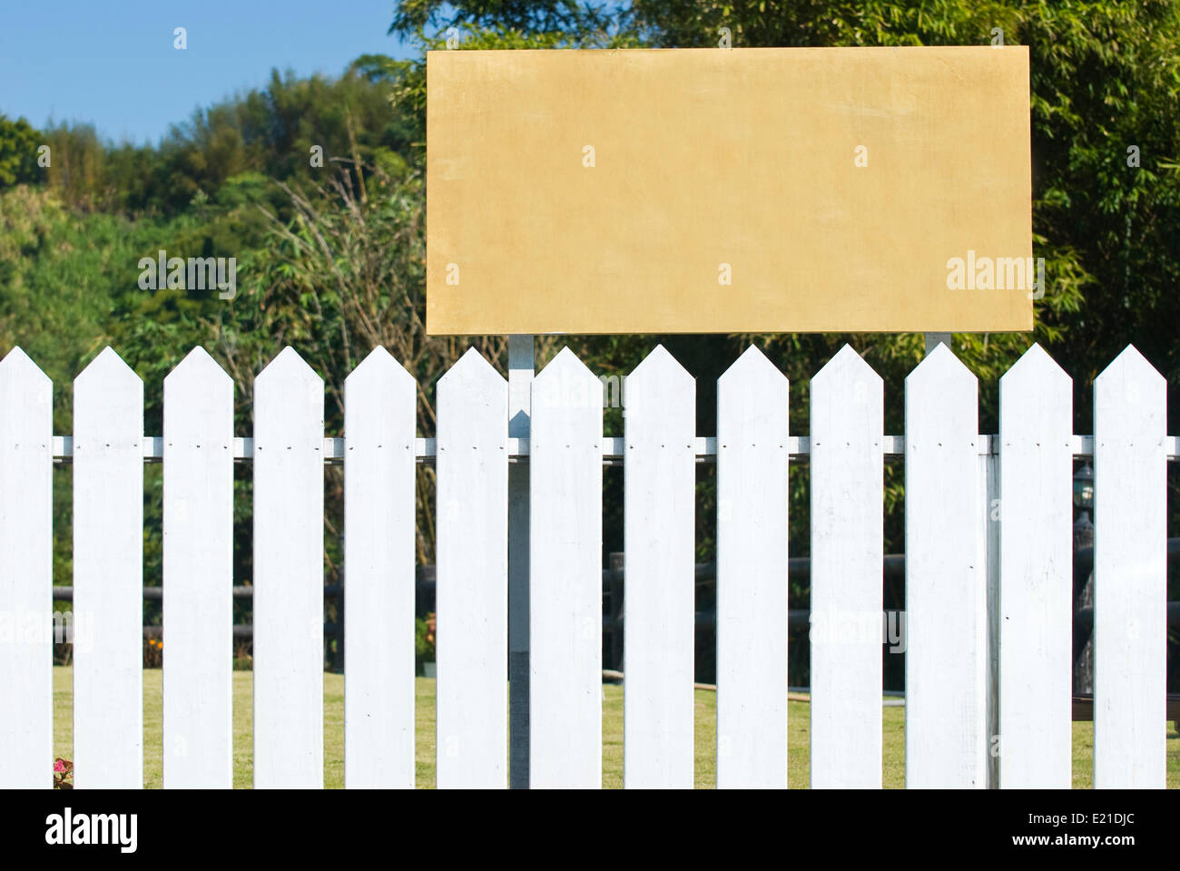 Blank wooden board for rent or sell estate Stock Photo - Alamy